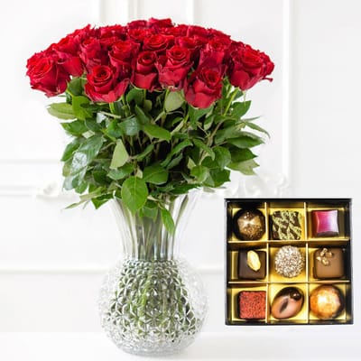 15 roses and a box of chocolates | Interflora